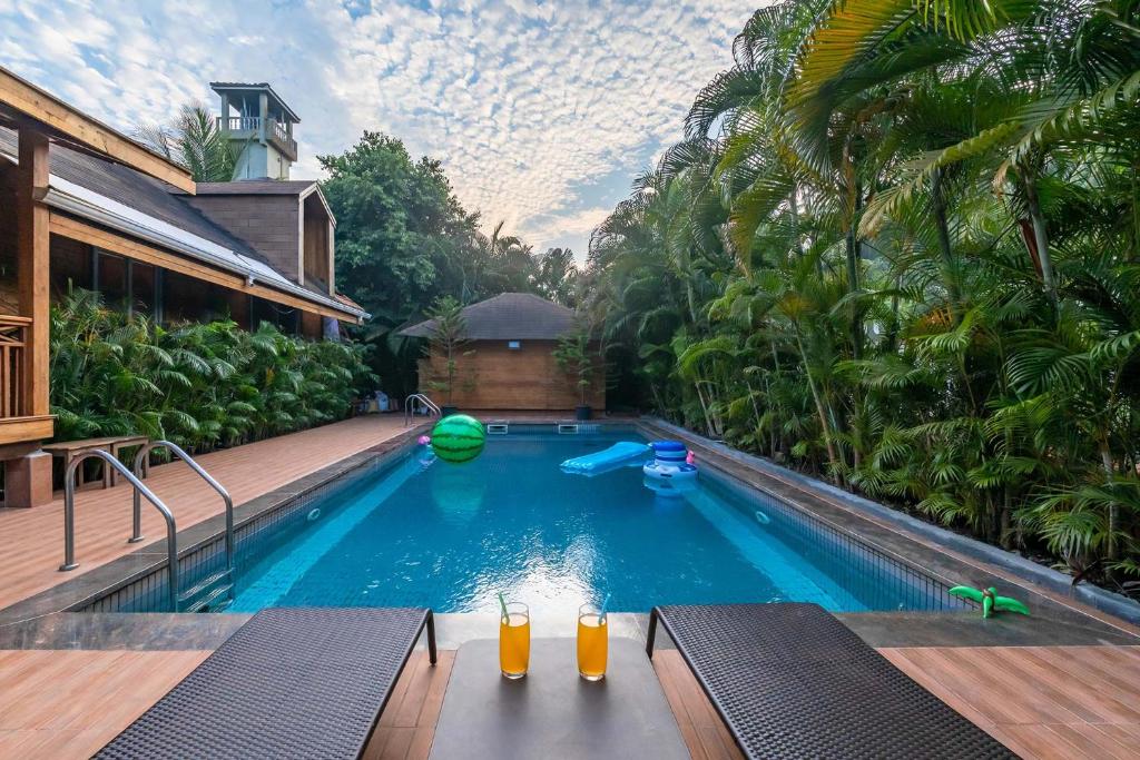 Nature's Abode - The Wooden Villa at Morjim by StayVista, Morjim ...