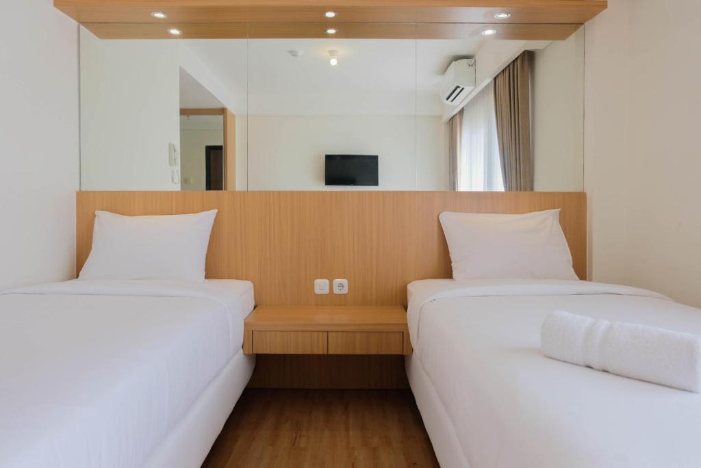 Twin Bed Studio Room at Annora Living Apartment By Travelio, Tangerang ...