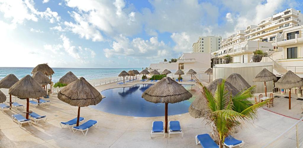 Oceanfront white sand beach condo for families, Cancún (updated prices ...