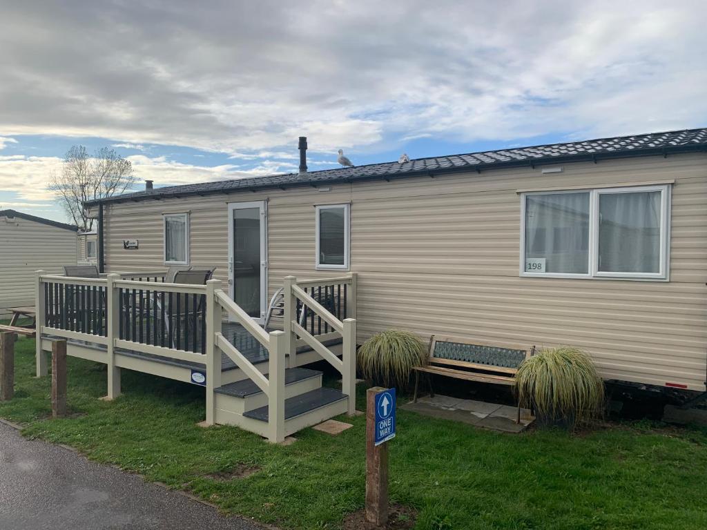 Gold Plus 6 Berth Caravan in NEW BEACH with parking WiFi and decking ...