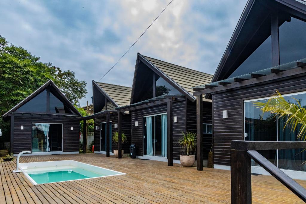 Rosa Lofts - Praia do Rosa อิงบิตูบา (ราคาอัปเดตปี 2024)