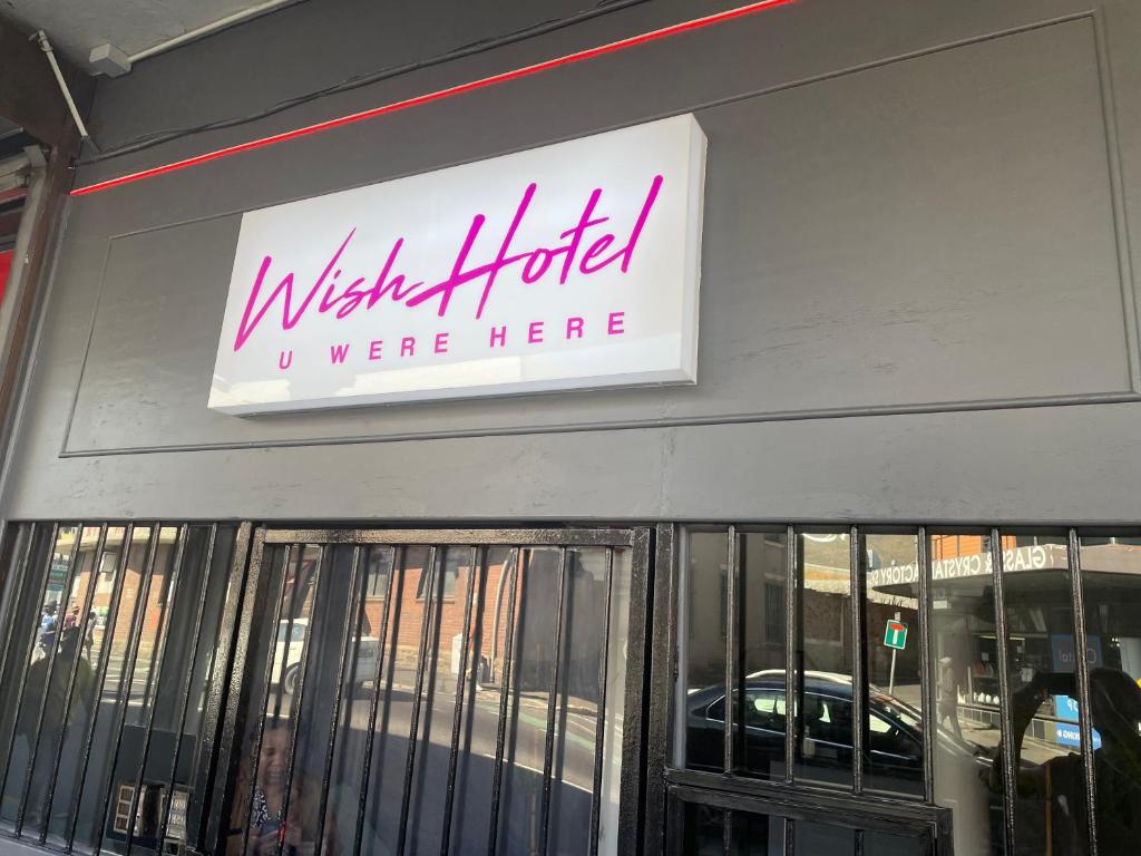 We Were Here Hotel Sign