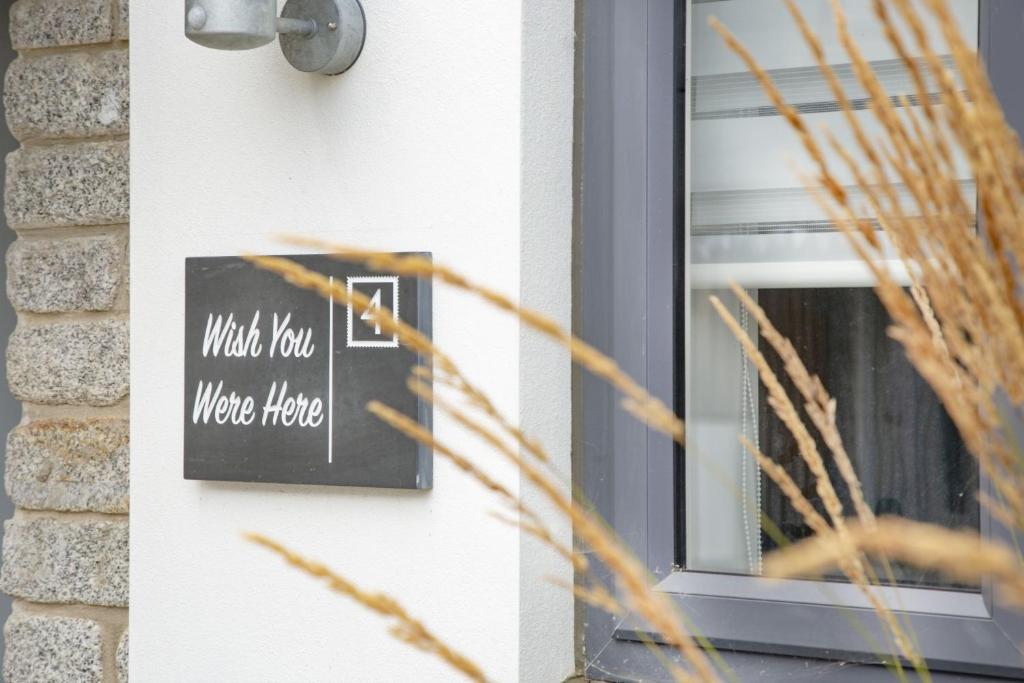 We Were Here Hotel Sign