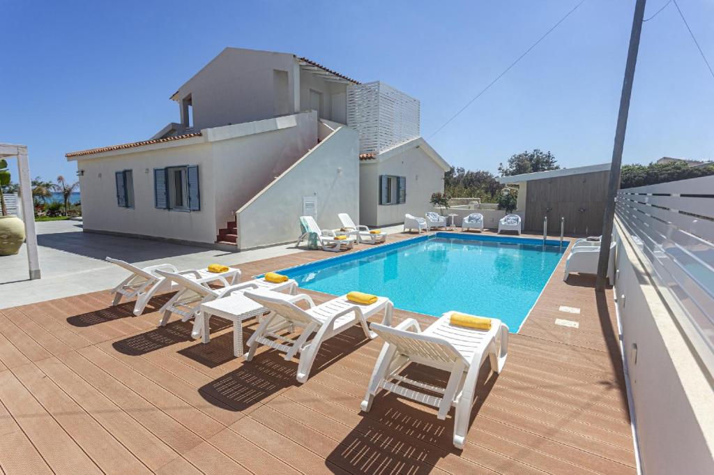 The villa offers a spacious, sea facing terrace ideal for taking in the ...