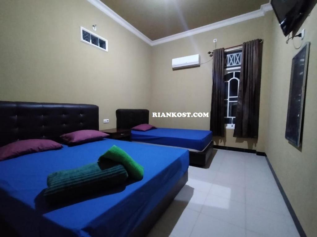 Rian Kost - Hotel Penginapan Murah Pusat Kota Palembang ปาเลมบัง (ราคา ...