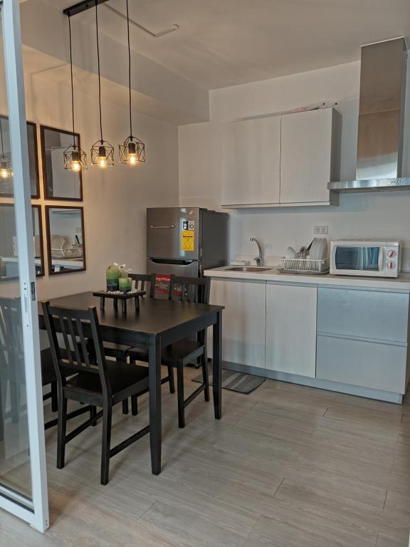 Charming Azure Condo with Wi-Fi plus Netflix, Manille – Tarifs 2024