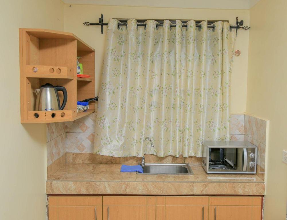 Self contained furnished room with Kitchen, Living room , laundry DStv ...