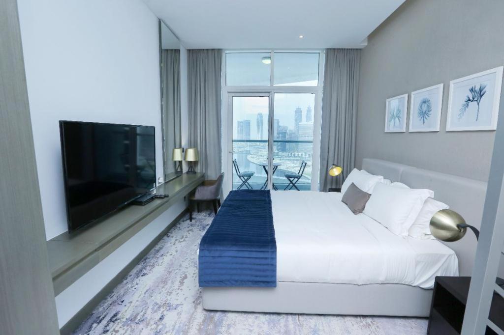 DAMAC MAISON PRIVE - Deluxe STUDIO WITH CANAL WATER VIEW ดูไบ (ราคาอัป ...