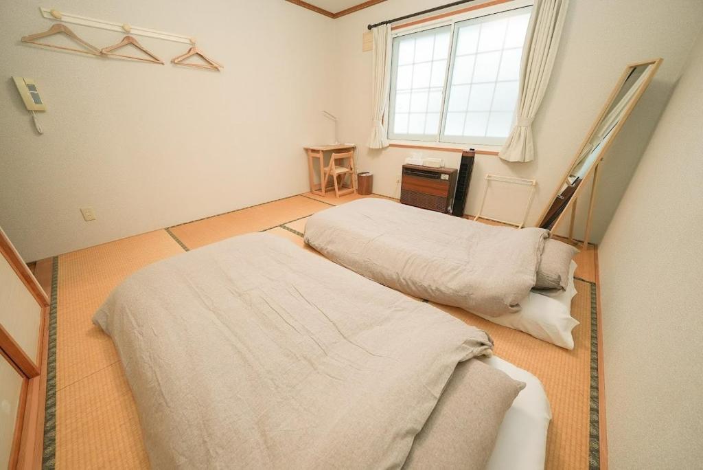 TESHIKAGA HOSTEL MISATO Economy Twin Room - Vacation STAY 98575v ...