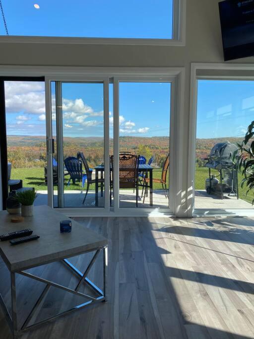 Condo de luxe vue sur golf, spa, foyer extérieur (Canada Sainte-Emélie ...