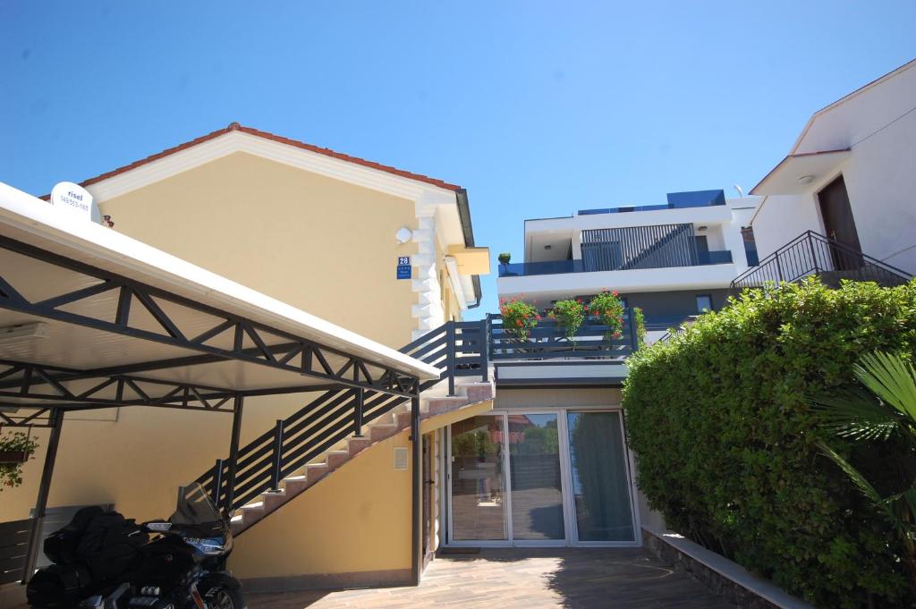 Apartments by the sea Njivice, Krk - 20499, Njivice (updated prices 2024)