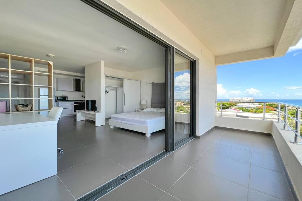 8th and top floor corner condo with dominant view, Cupecoy (bijgewerkte ...