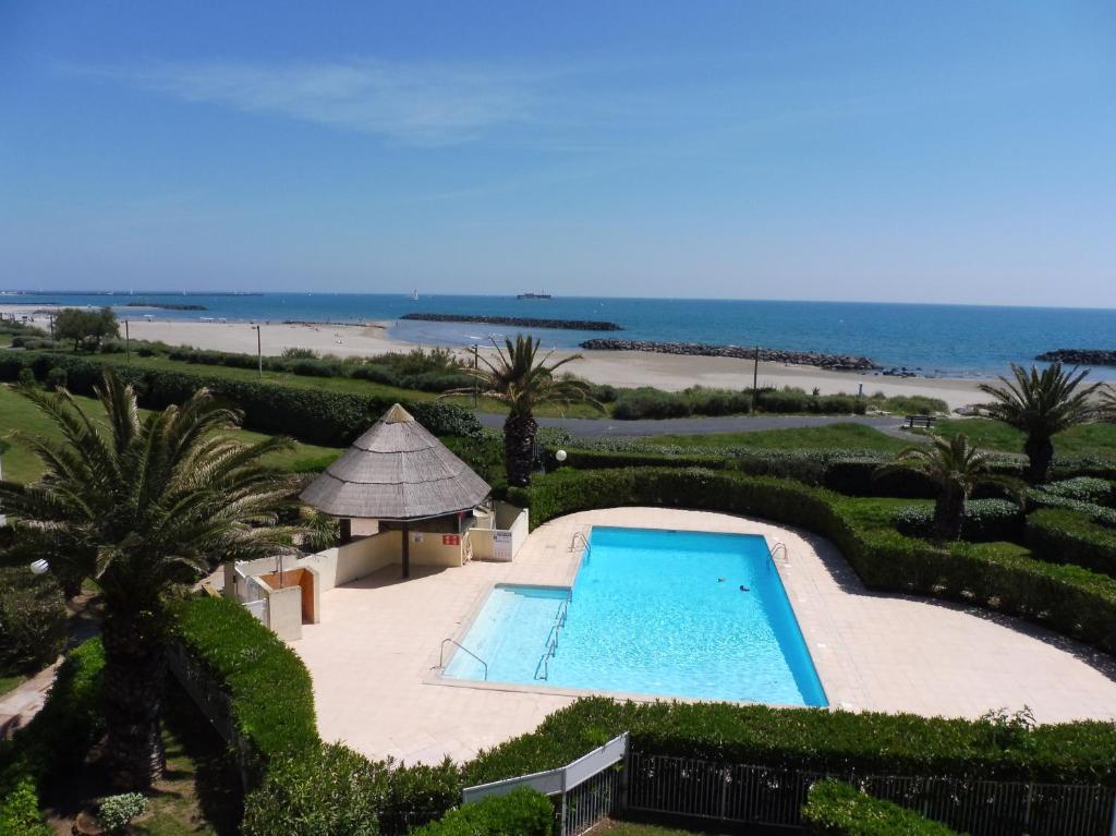SAVANNA BEACH I Joli T3 vue mer piscine Cap d'Agde（カップ・ダグド）：（最新料金：2025年）