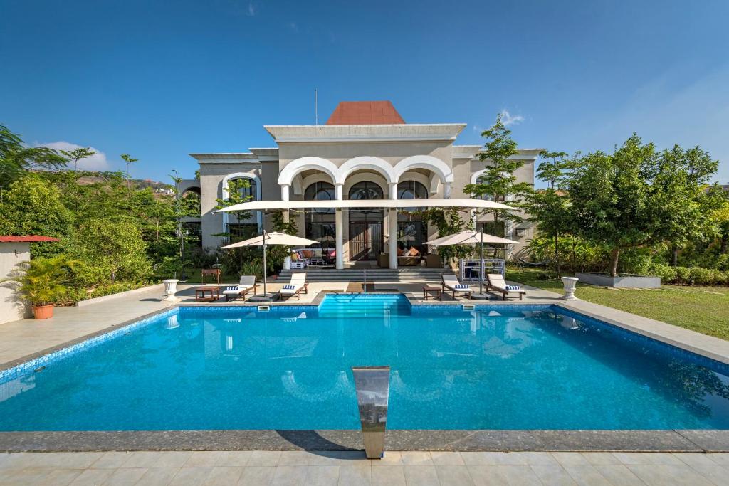 SaffronStays Zuma Villa - 7BR pet-friendly villa with heated pool, 6000 ...