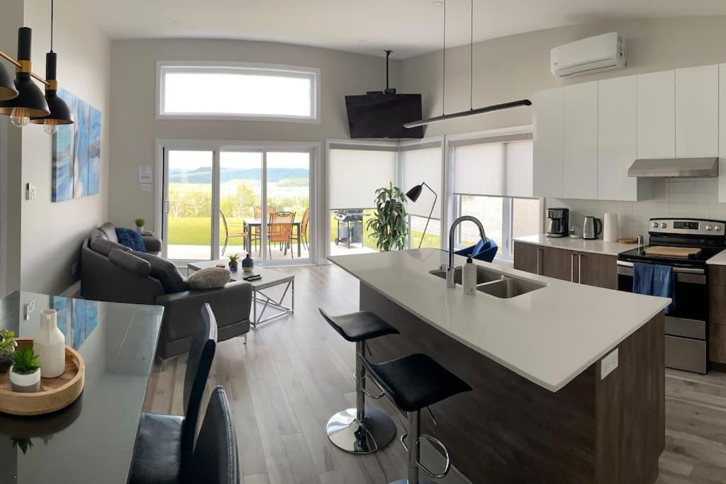Condo de luxe vue sur golf, spa, foyer extérieur (Canada Sainte-Emélie ...