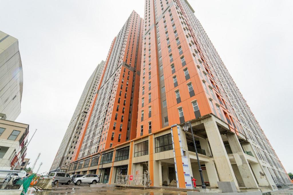 RedLiving Apartemen Transpark Juanda - Frams Properti Tower Jade with ...