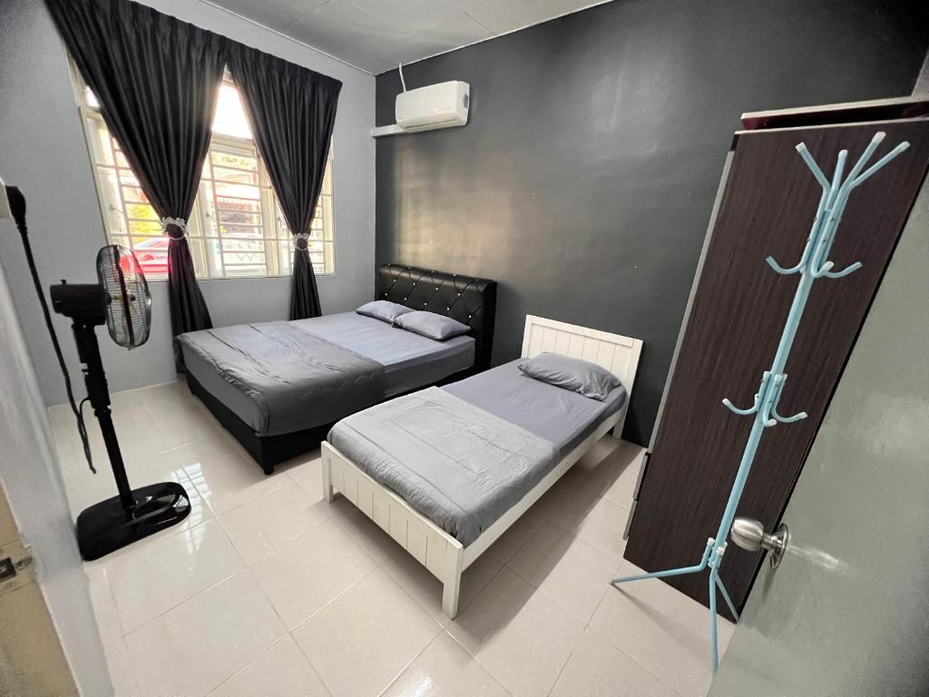 2 Bedroom house with Coway, all room air-cond, WIFI, Nettflix, Kampung ...