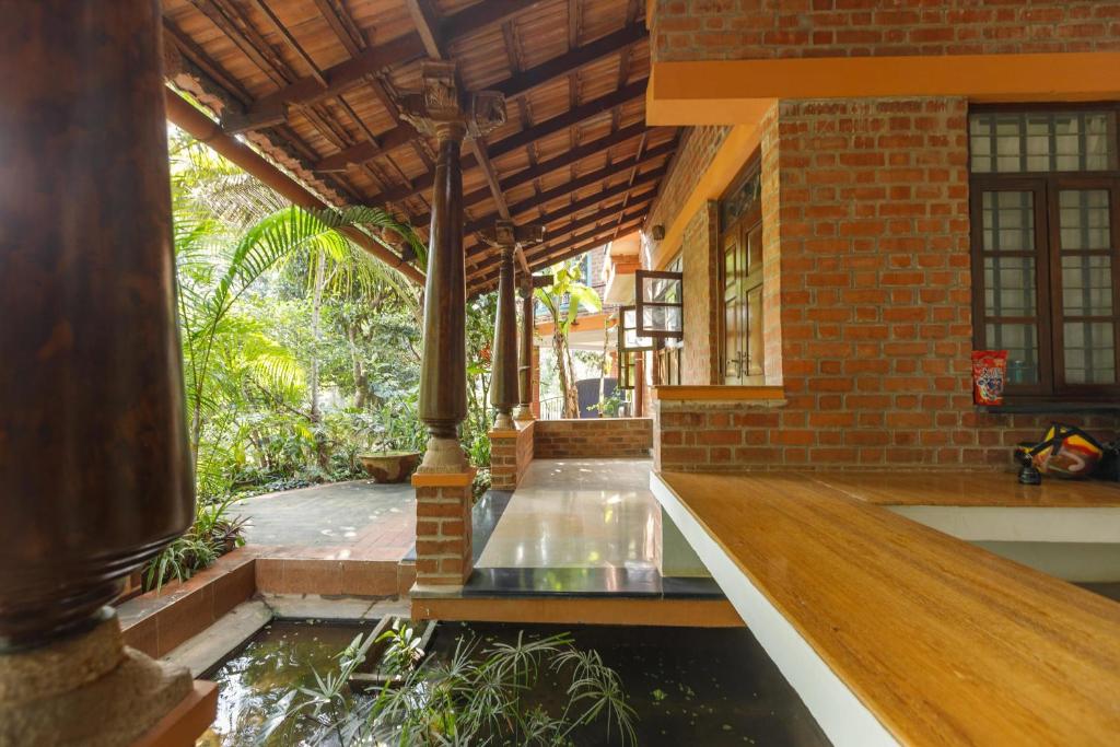 Kerala Traditional House With Pond