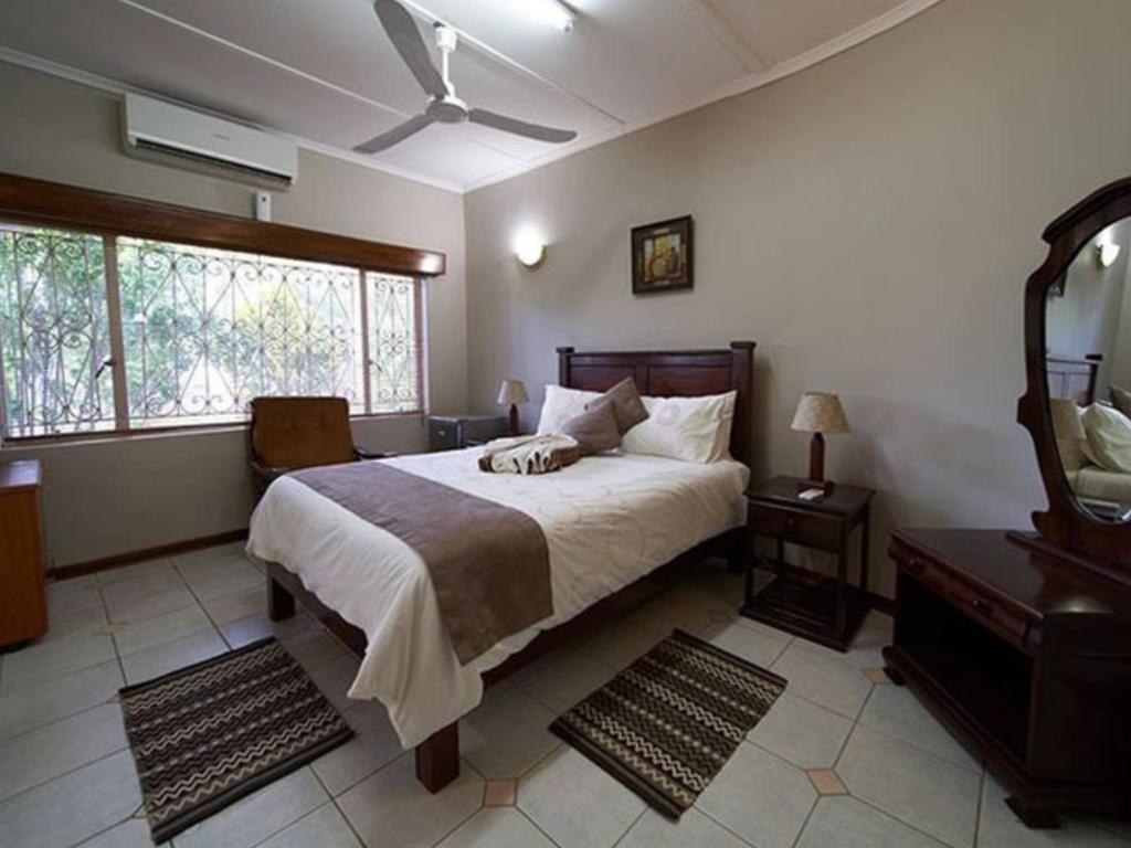 Room in Villa - Zambezi Family Lodge - Lion Room, Victoria Falls ...