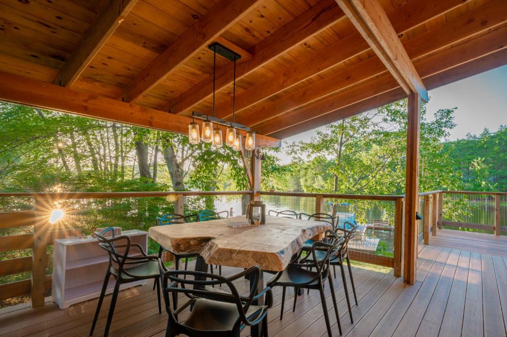 Stylish lake home with private beach, dock and firepit for swimming ...