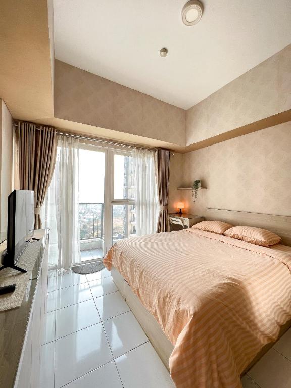 Warmth in Every Corner Cozy Studio Casa De Parco, South Tangerang ...