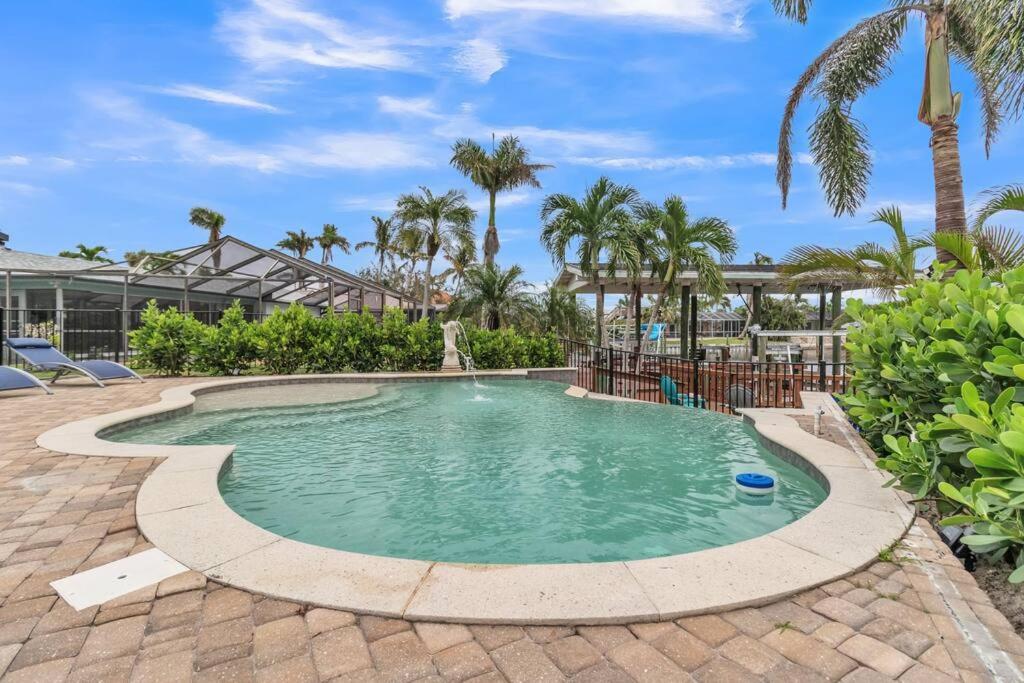 Waterfront 4BR Home with Heated Pool, Boat Lift, Free Parking, Near ...