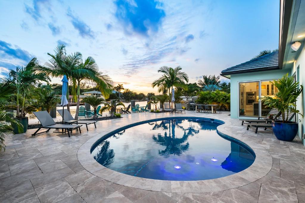 Welcome to the Bahama Breeze, A Sunny Waterfront Heated Pool Home ...