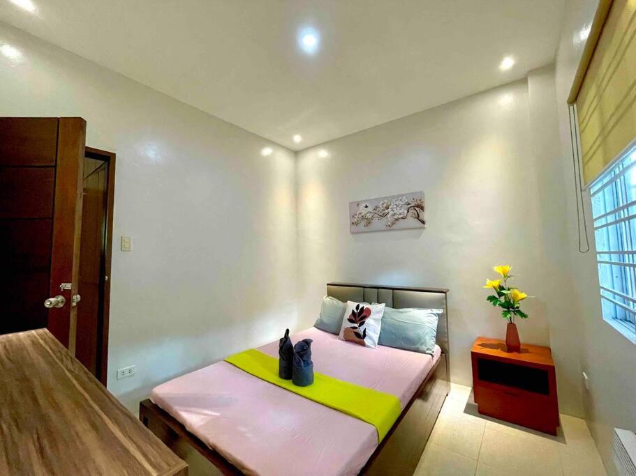 Cozy Flat San Pedro Filipino Minimalist Inspired Unit with 40inchSmart ...