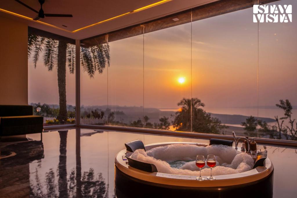 StayVista's Lake Pearl Serenity - Riverside, Mountain-View Villa with Jacuzzi, Sprawling Lawn ...