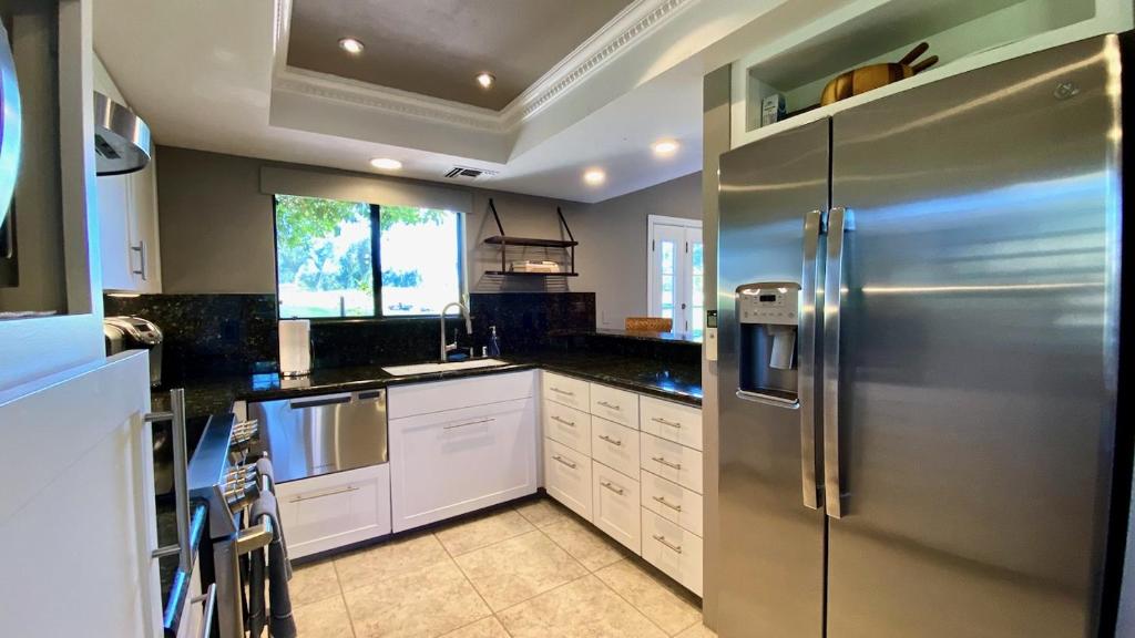 COTTAGE on the GREEN, one-of-a-kind garden home with 2+ primary suites ...