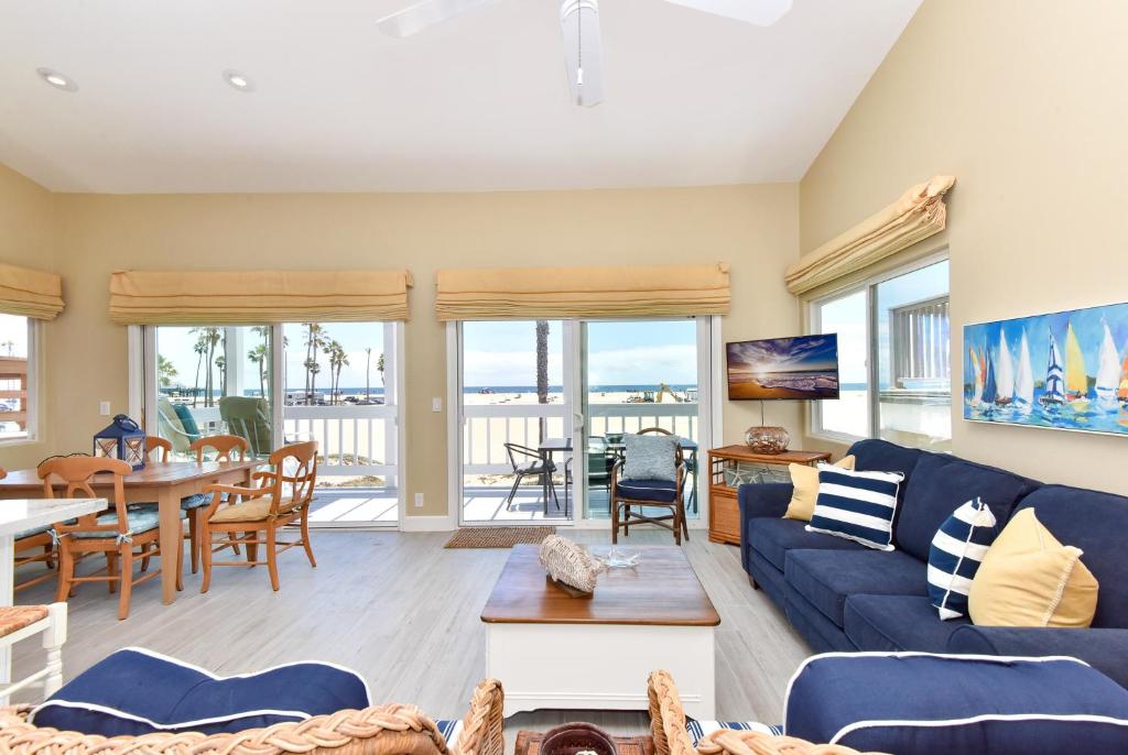 Multi Level Oceanfront Home with Patio on the Beach, Fire pit and 2 car ...