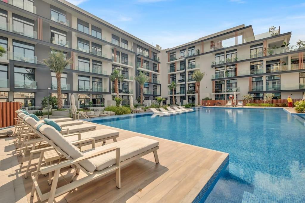 Stunning Pool View Studio in JVC, Dubai (updated prices 2025)