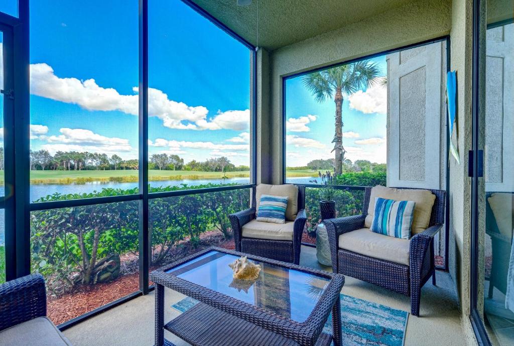 Sunny Resort Condo! Golf course and lake views! Located in River Strand ...