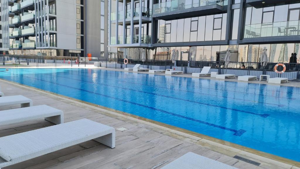 Marco Polo - Spacey Studio With Balcony at JVC, Pool & Gym, Dubai ...