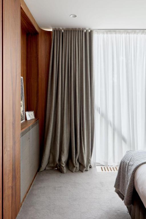 Architectural glass house with ocean views, Taroona (updated prices 2025)