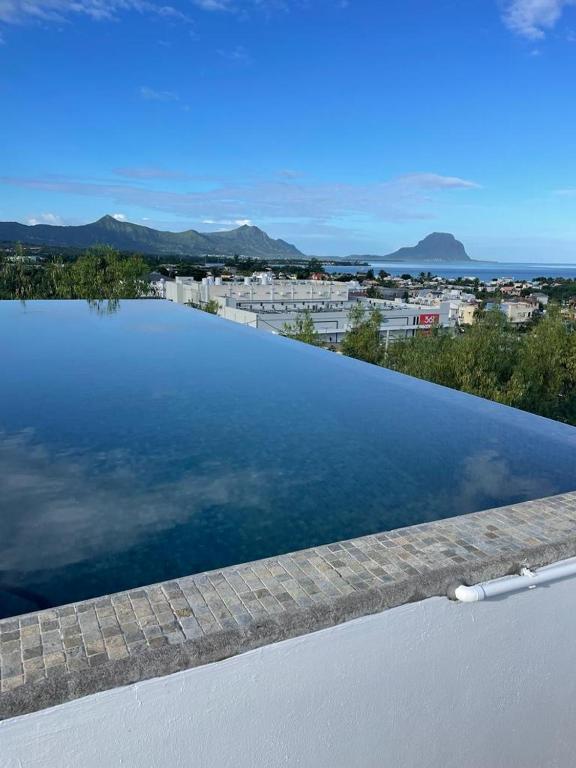 One loft design rooftop pool, Rivière Noire (updated prices 2026)