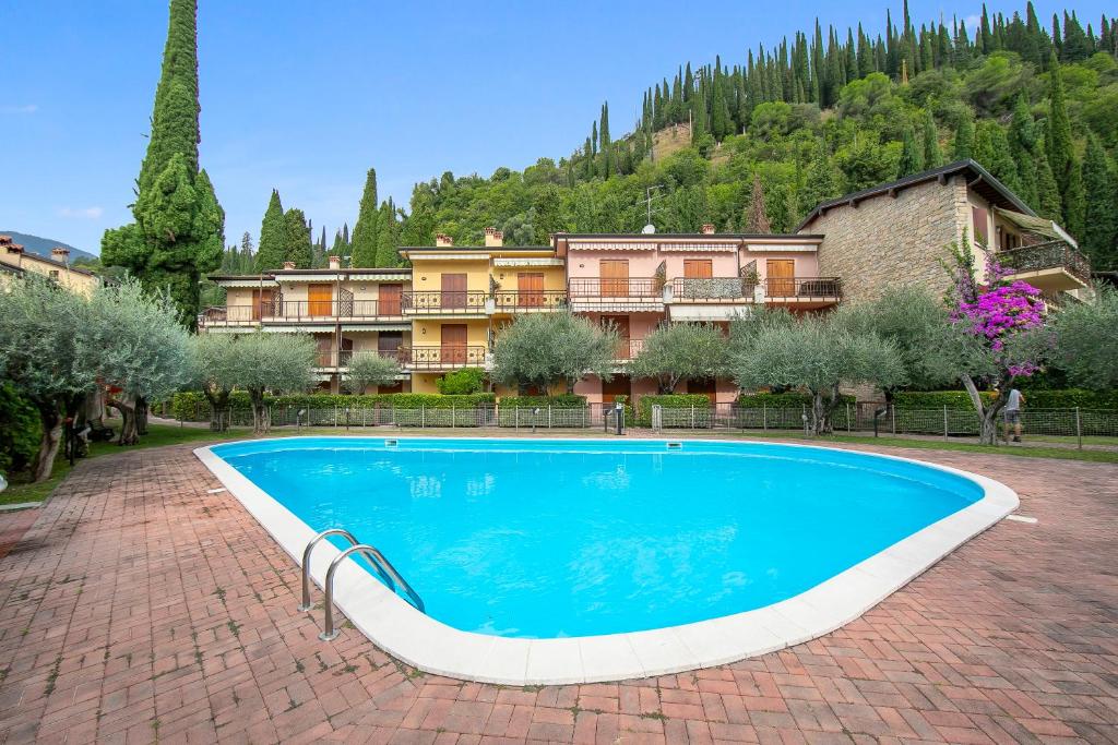 Verde Giada with shared pool - Happy Rentals, Toscolano-Maderno ...