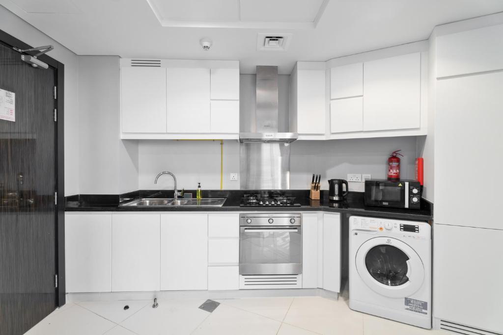 Nasma Luxury Stays - Charming Studio at DAMAC Hills Artesia Tower C ...