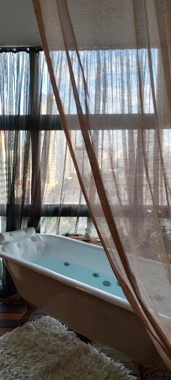 Loft TEMÁTICO Oásis com vista ESPETACULAR, Sao Paulo (updated prices 2025)