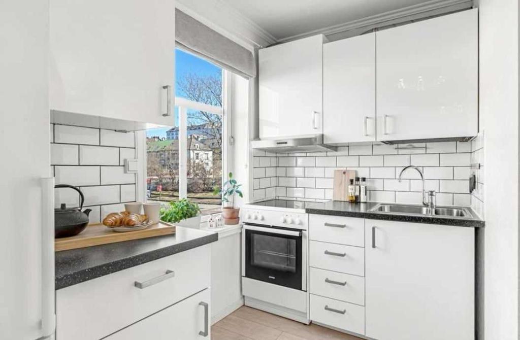 Lys og praktisk 2-roms på Solsiden, Trondheim (preços atualizados para ...