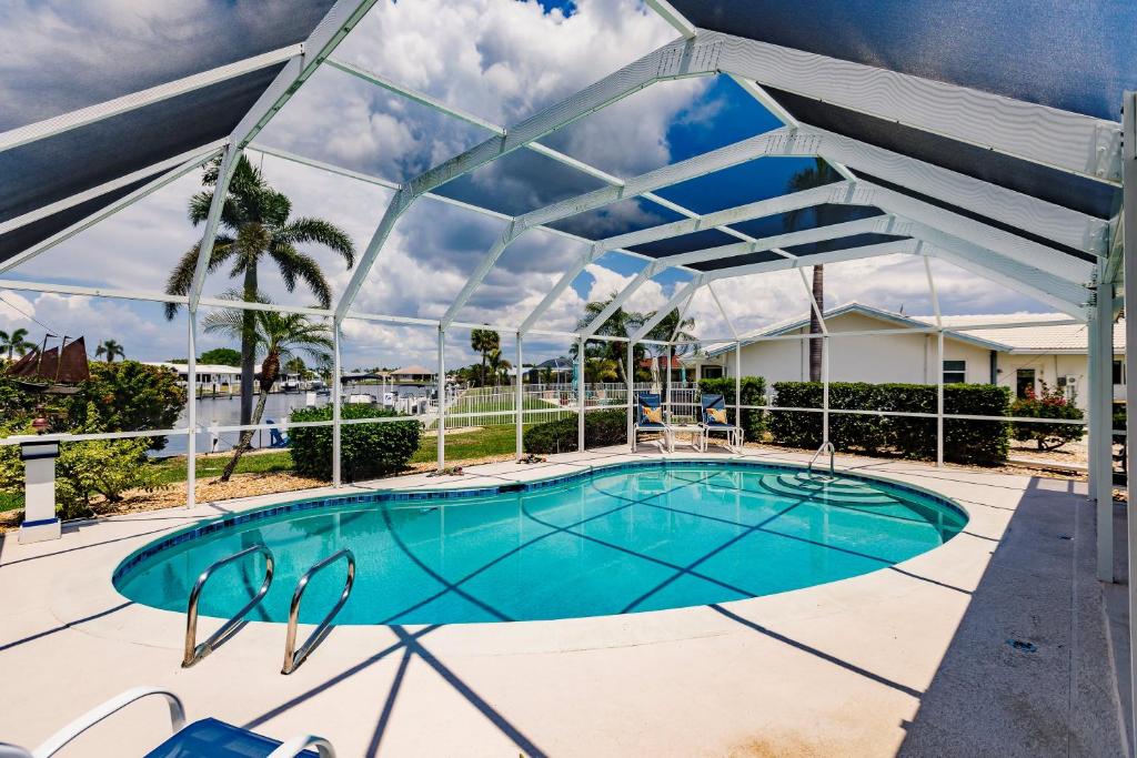 Spacious Waterfront Escape with Sun-Soaked Pool and Dock, Punta Gorda ...
