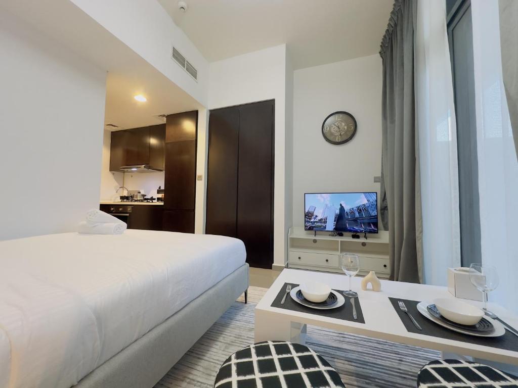 Quickstay Homes 23 - Studio with a Pool View at Merano Tower, Dubai – Updated 2024 Prices