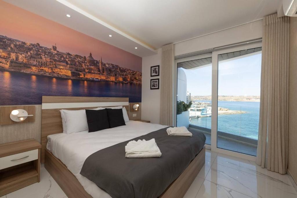 Ivory Suite seafront with views!- Fl 8 by Homely, St. Paul's Bay ...