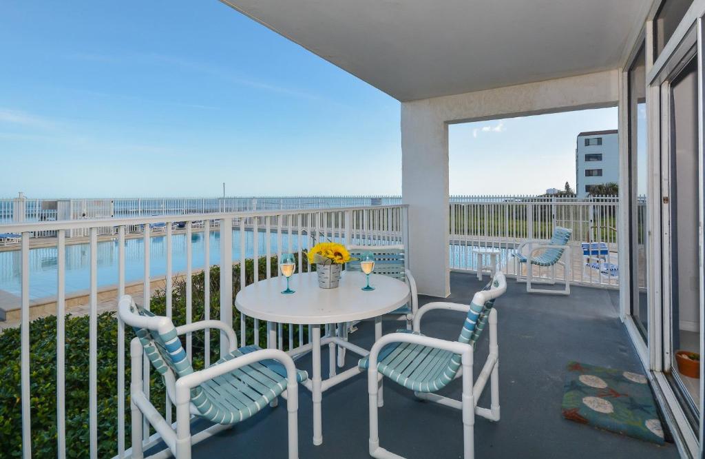Ocean Condo 104 ~ Ground Floor Corner Condo with wrap around balcony ...
