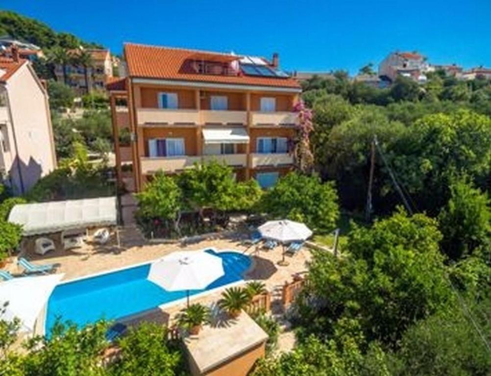 Apartments with a swimming pool Banjol, Rab - 22848, Rab (updated ...