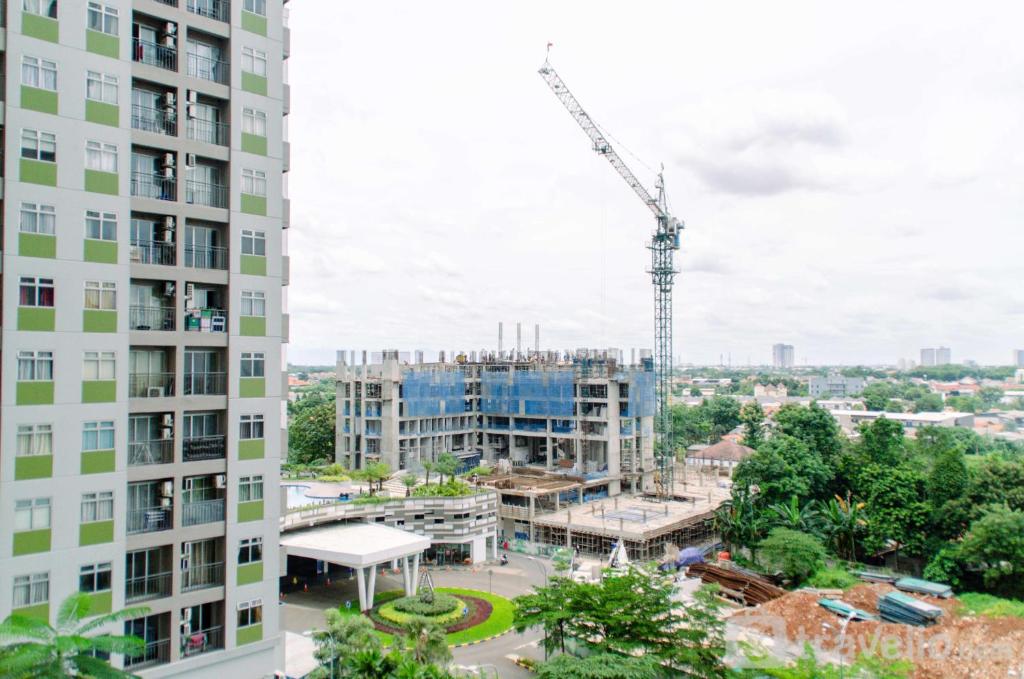 Cozy Living Studio Room at Serpong Greenview Apartment By Travelio ...