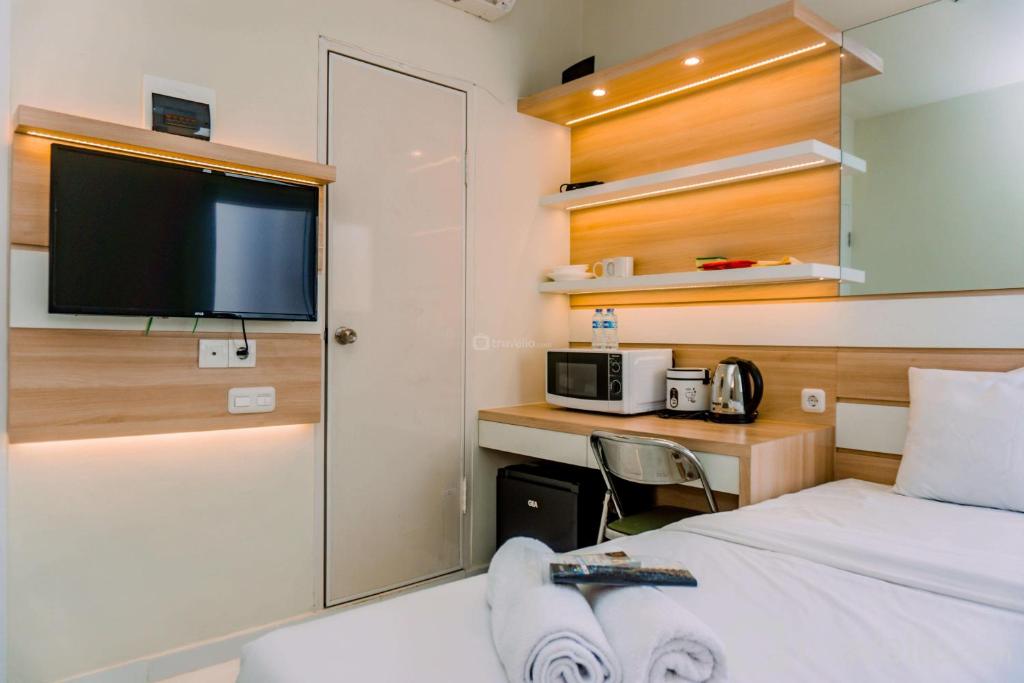 Simply Studio Apartment at Aeropolis Residence By Travelio, Tangerang ...