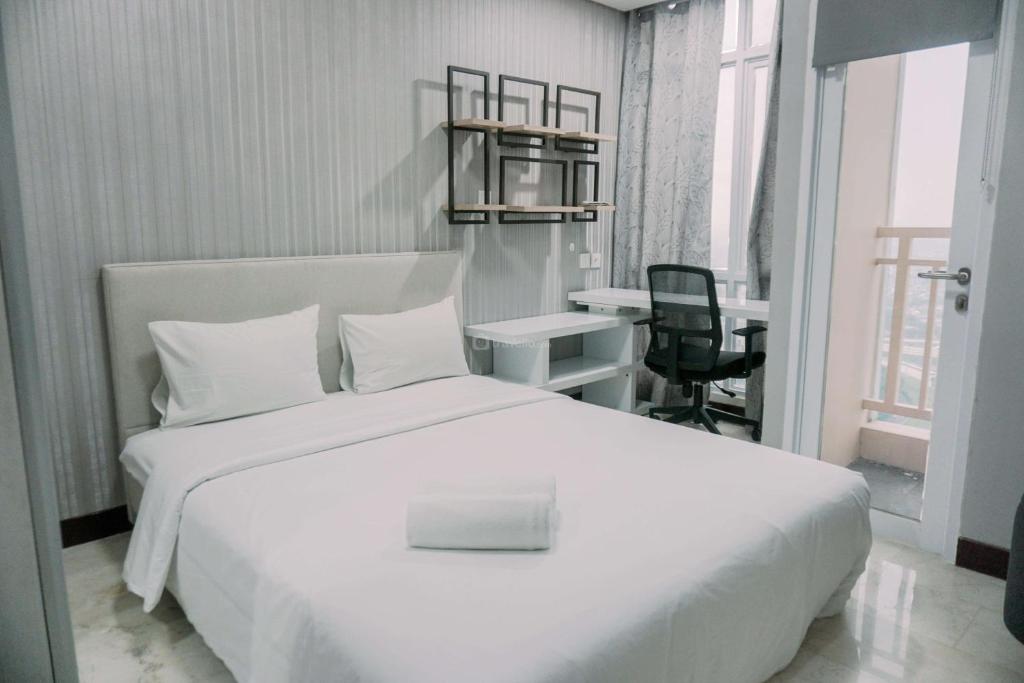 Homey and Comfy Stay Studio Apartment at B Residence By Travelio ...