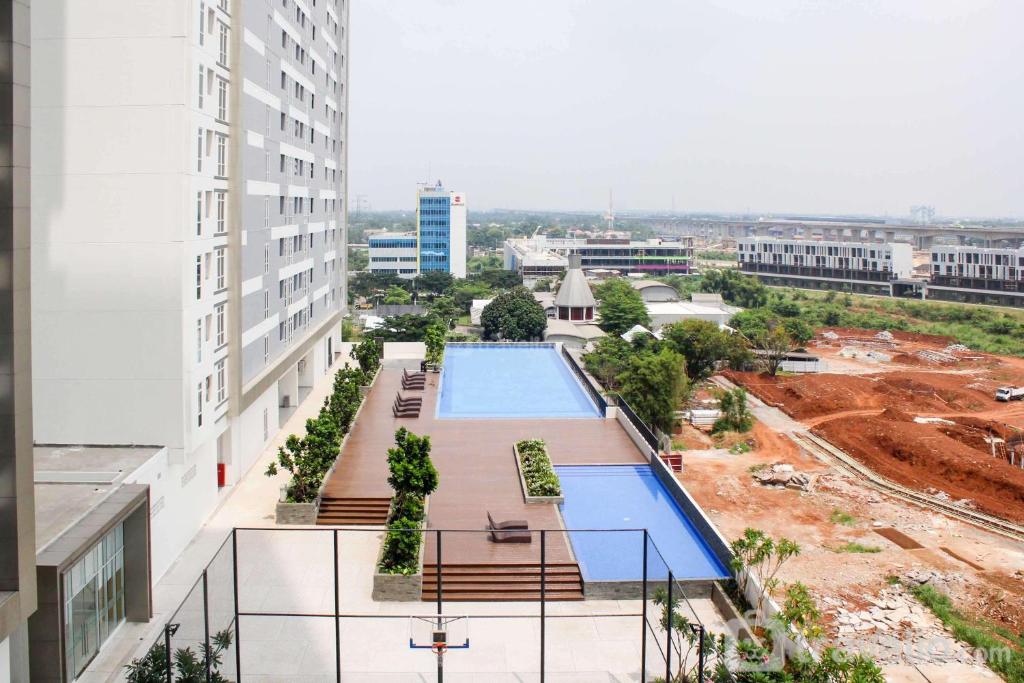 Cozy Stay and Tranquil Studio at Vasanta Innopark Apartment By Travelio ...