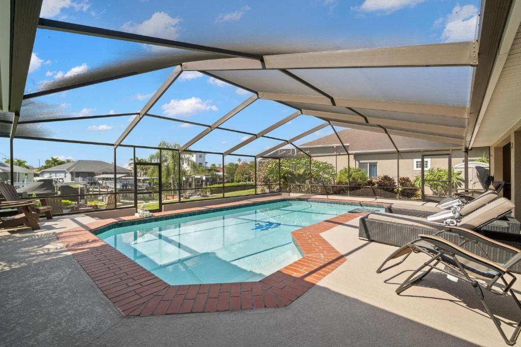 Surfside Beach House - Gorgeous Canal Front Home - Heated Pool & Boat ...